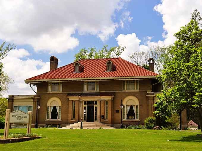That red tile roof and cream brick exterior aren't just pretty, they're a time machine to elegance.