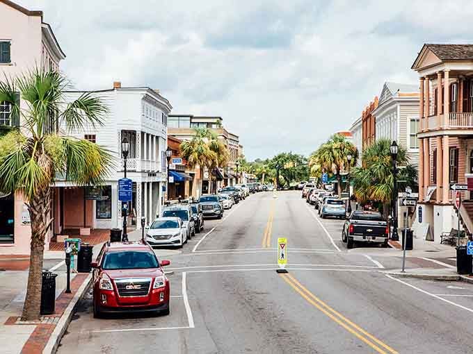 Bay Street stretches out like a postcard from a gentler era, where palm trees and porches still matter.