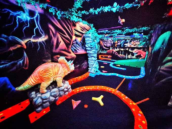 Dinosaurs and neon collide in this wonderfully weird mini golf paradise that makes regular putt-putt look positively boring.