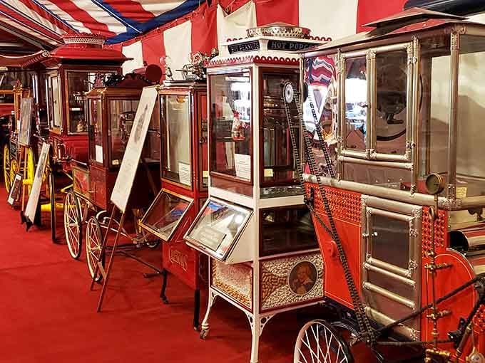 Step inside this carnival-colored wonderland where popcorn history pops to life under striped tent ceilings and vintage charm.