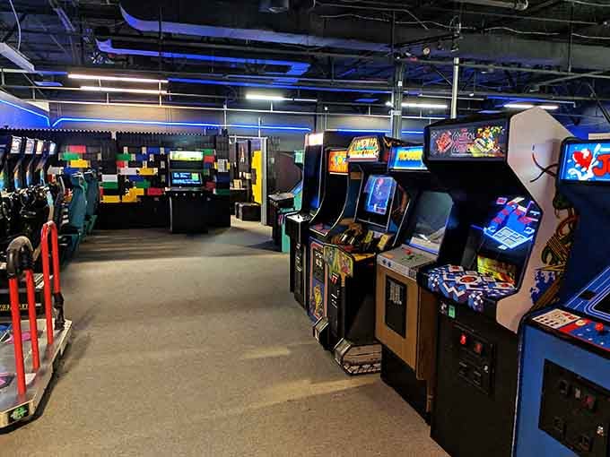 Row after row of glowing cabinets stand ready like soldiers in the most fun army ever assembled.