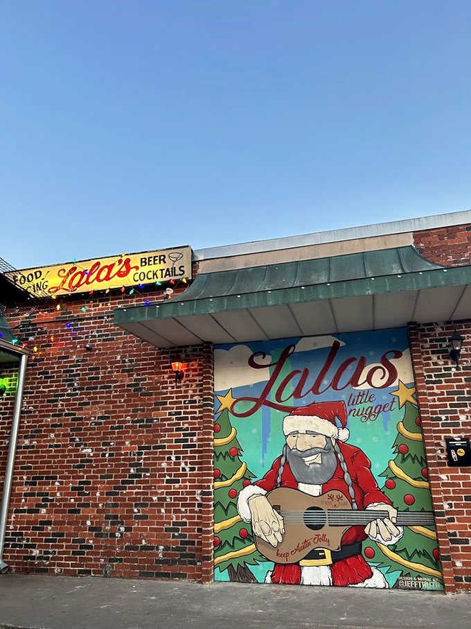 That Santa mural outside isn't just decoration, it's a promise of the joyful chaos waiting inside.