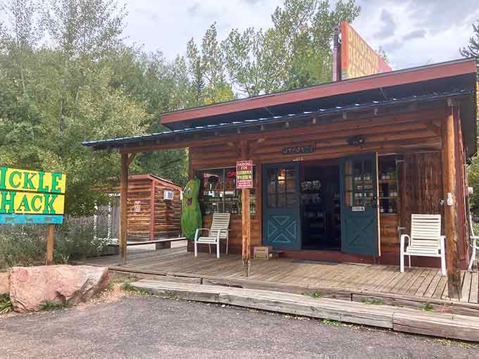 That cheerful pickle mascot greeting you from the porch is basically Colorado's answer to the Statue of Liberty.