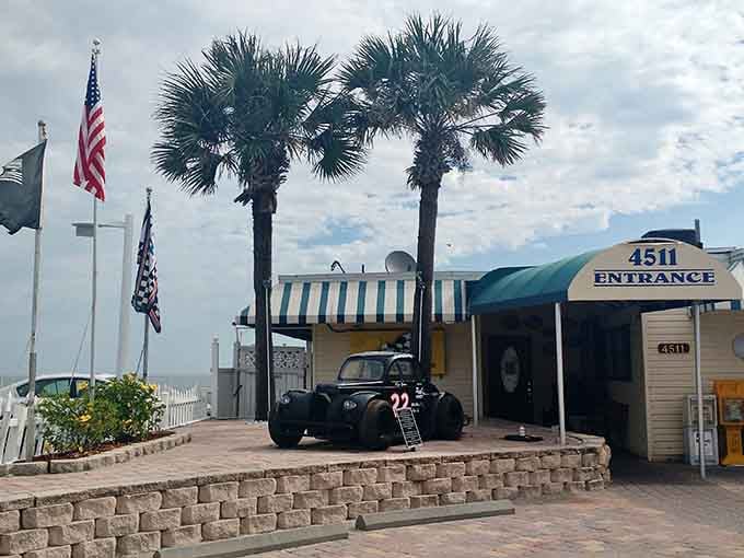 That vintage race car out front isn't just decoration—it's your first clue you've found something special.