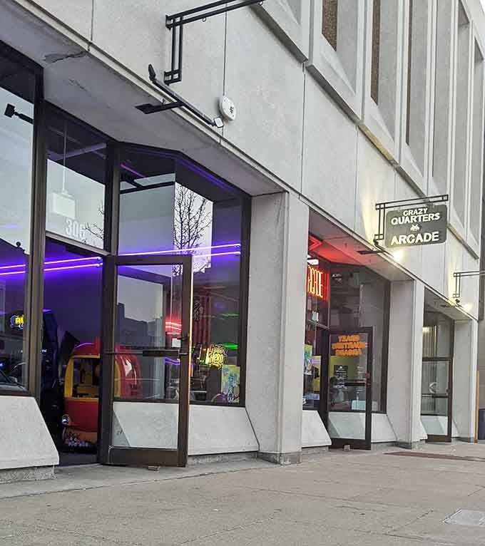 The neon glow beckons from downtown Bay City, promising an evening of retro gaming glory inside.