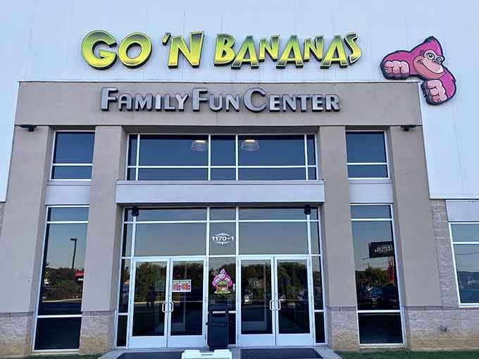 That pink gorilla mascot knows exactly what he's doing, luring families in with pure whimsy and promise.