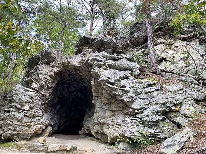 The entrance to Tory's Den rises from the earth like nature's own grand doorway to adventure.