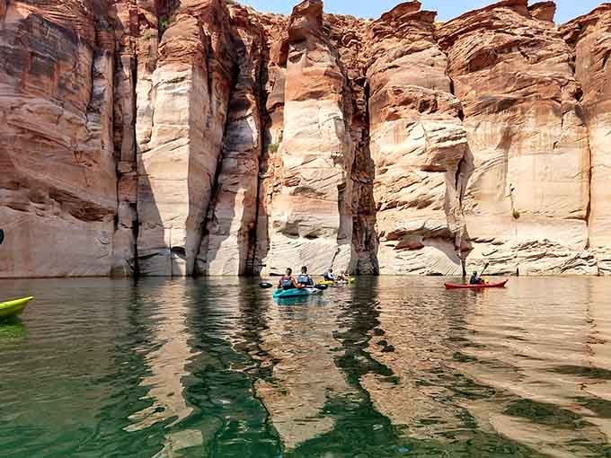 Towering canyon walls frame your path as you paddle into nature's own cathedral of stone.