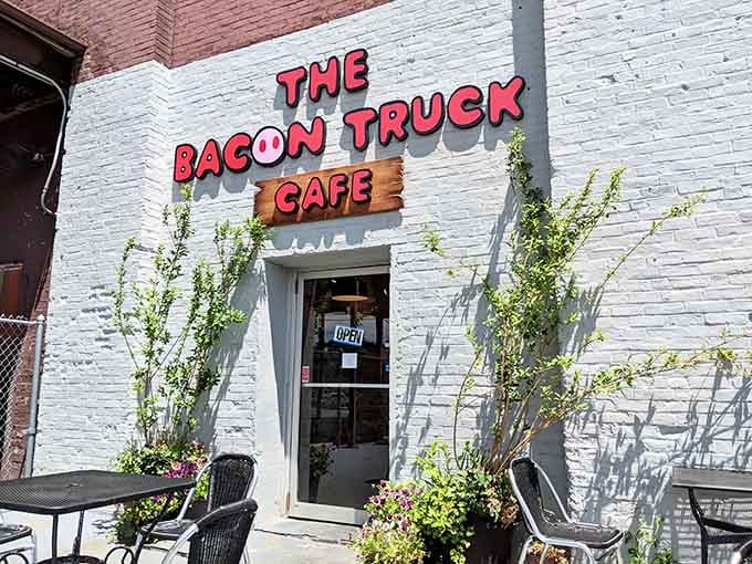 That bold red signage against white brick isn't just decoration, it's a promise of pork-fueled happiness waiting inside.
