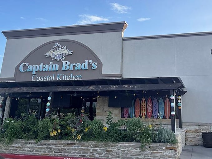 That stone facade and turtle logo are your first clue that something special awaits inside this coastal hideaway.