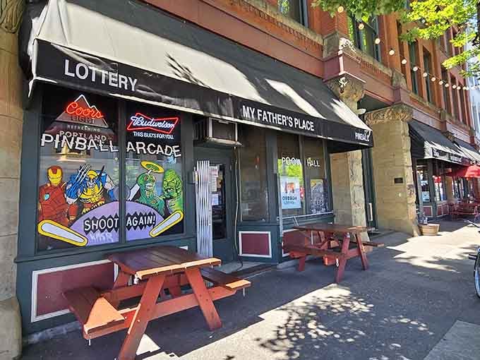 That storefront promises lottery dreams and pinball nostalgia, but the real jackpot is what's cooking inside those doors.