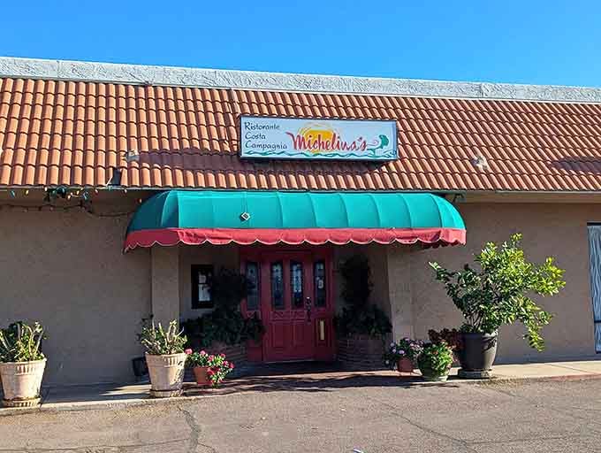 That turquoise awning isn't just decoration; it's a beacon guiding you toward serious Italian comfort food.