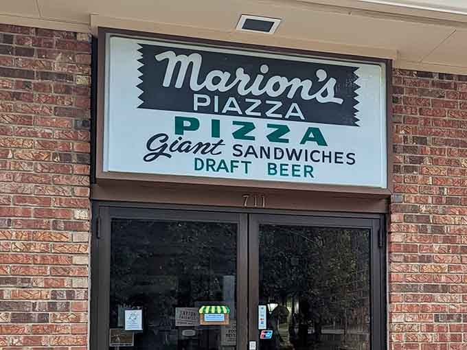 That classic sign isn't just advertising pizza; it's announcing a Dayton tradition that's fed generations of hungry families.