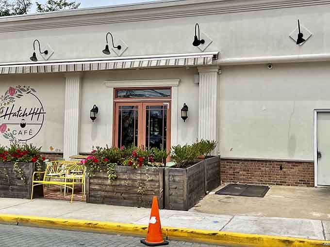 That white facade with a wooden door isn&rsquo;t just an entrance, it&rsquo;s your gateway to brunch paradise.