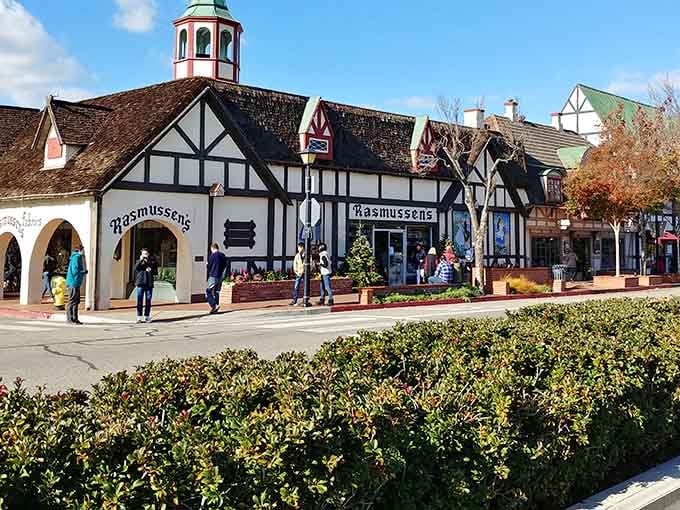 Classic Danish storefronts invite shoppers to explore, with traditional architecture creating an authentic European village atmosphere throughout downtown.