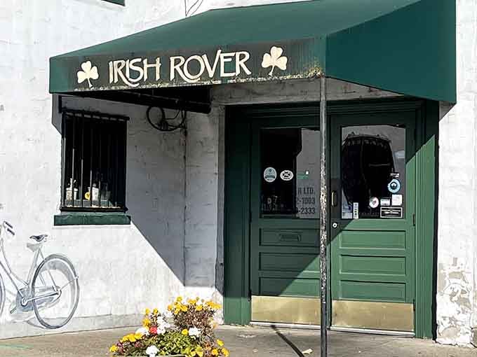 Behind that charming green door waits the kind of welcome that makes strangers feel like regulars.