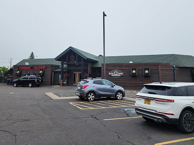 That wood-paneled exterior isn't trying to impress anyone, which is exactly why it impresses everyone who walks in.