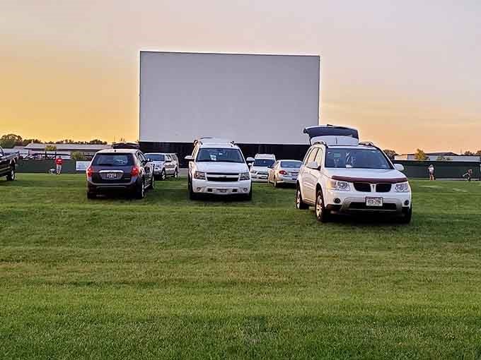 That massive screen rising from the Wisconsin countryside promises an evening of pure, unfiltered movie magic.