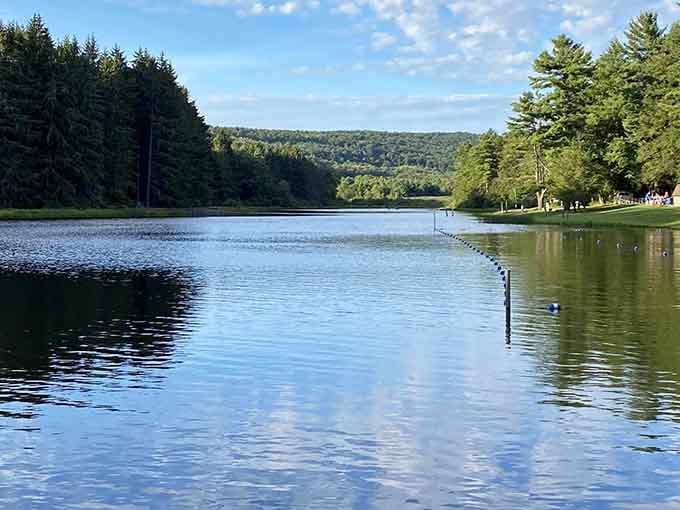 Mirror-smooth water reflecting endless sky &ndash; nature's way of showing off its Photoshop skills without the subscription fee.