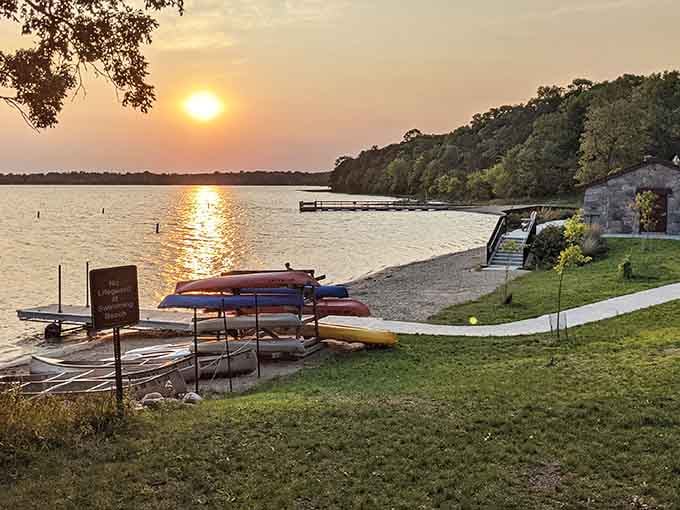 Golden hour at the lake hits different when you're surrounded by trees that look like they're showing off for fall.