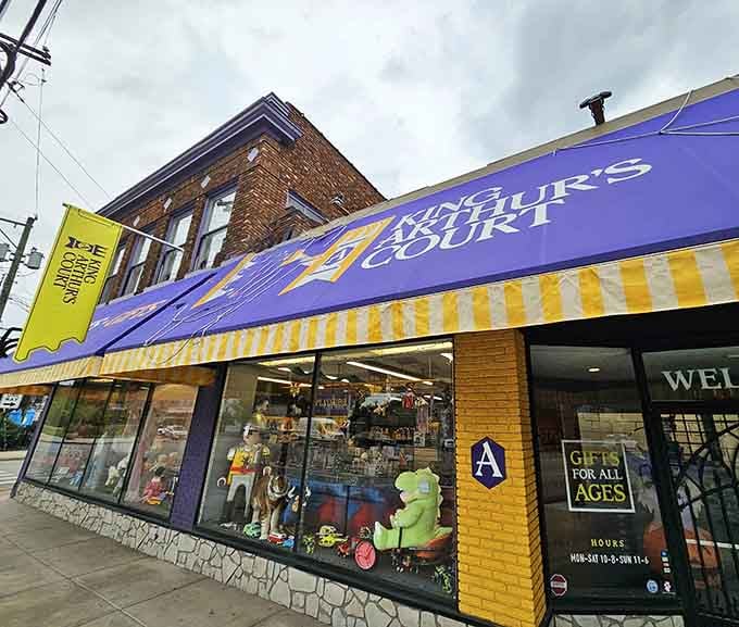 That purple and yellow awning announces itself like a royal proclamation: childhood wonder lives here, friends.