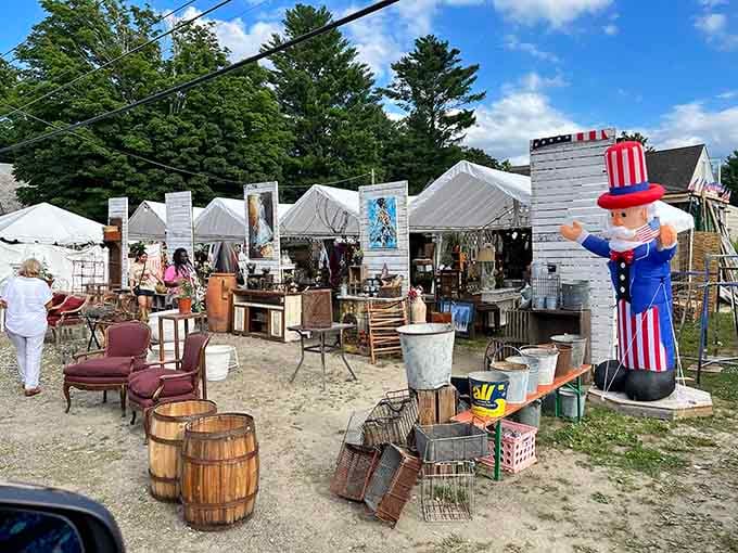 White tents stretch endlessly across fields where treasure hunters roam like happy, well-fed pilgrims seeking vintage gold.
