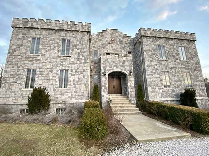 That arched wooden door and manicured walkway invite you into a fairy tale you never expected to find in the Midwest.