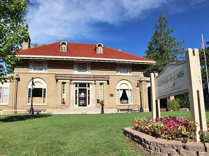 That red tile roof and cream brick exterior aren't just pretty, they're a time machine to elegance.
