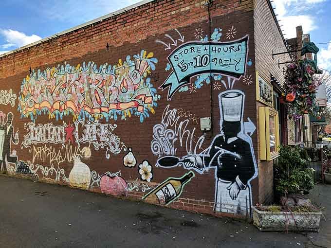That whimsical street art isn't just decoration; it's a delicious warning that normal Italian dining rules don't apply here.