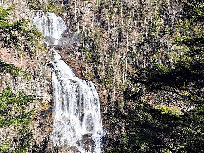 Eight hundred eleven feet of pure mountain magic cascading down ancient rock like nature's own standing ovation.