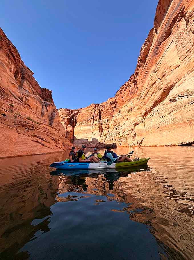 Towering canyon walls frame your path as you paddle into nature's own cathedral of stone.