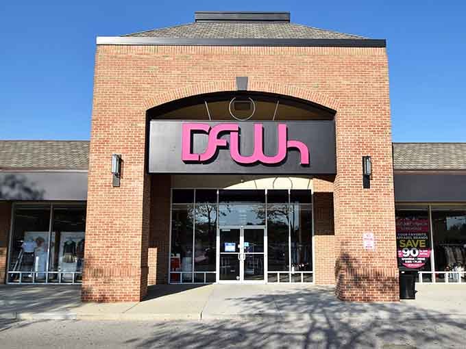 That bold pink logo against classic brick architecture signals the start of your bargain-hunting adventure in style.