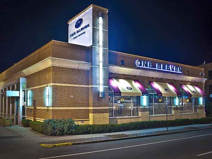 The modern exterior glows like a beacon for steak lovers, promising culinary excellence inside those illuminated walls.