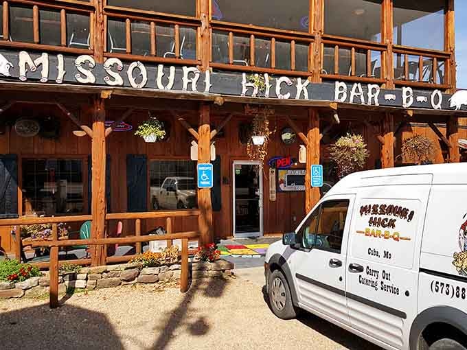 That two-story wooden facade isn't just for show&mdash;it's basically announcing "serious barbecue happens here" in architectural form.
