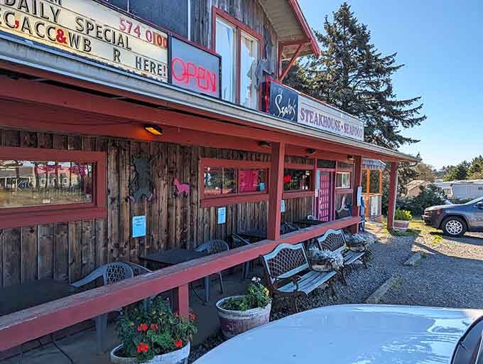 That glowing "OPEN" sign is like a beacon calling you home to serious steak and seafood.
