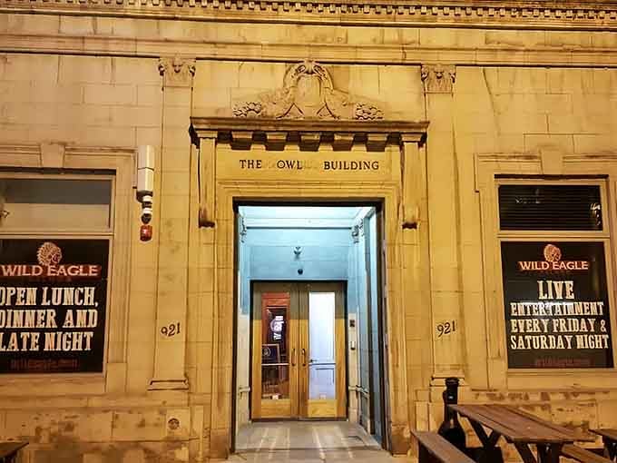 The Owl Building's grand entrance promises something special inside, where Cleveland's architectural past meets your burger-loving future.