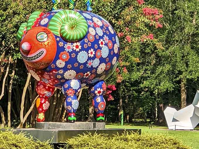 When your local sculpture garden casually drops a psychedelic creature that looks like joy took physical form.