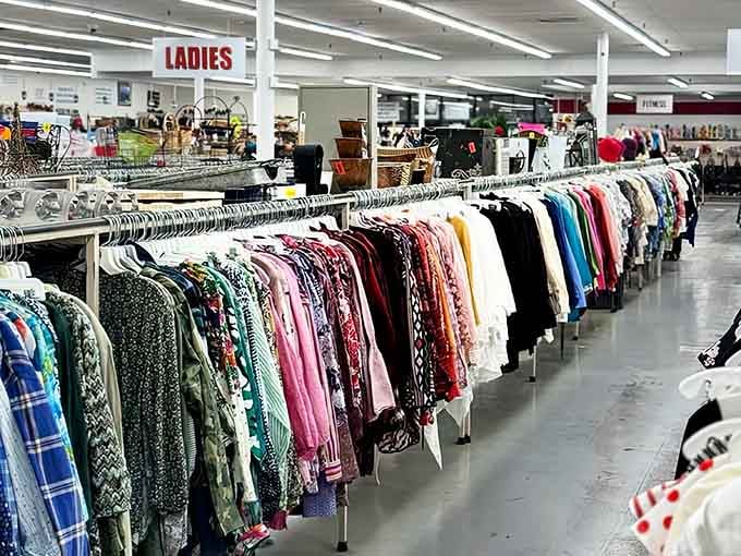 The ladies' section stretches endlessly forward, proving that one person's closet purge is another's wardrobe jackpot