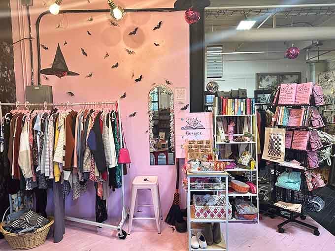 That pink wall and those Halloween decorations aren't messing around, this is retail therapy with serious style credentials.