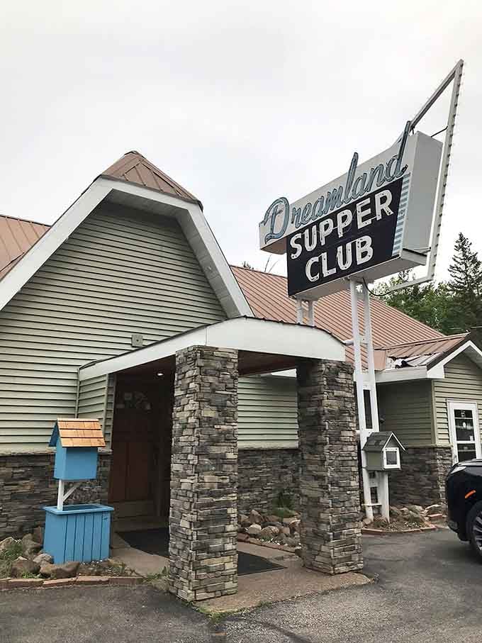 That vintage sign isn't trying to be retro, it's the real deal welcoming hungry souls to supper club paradise.