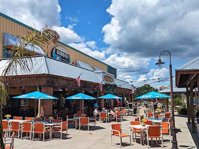 Those turquoise umbrellas against blue Wisconsin skies create the perfect backdrop for pretending you're dining somewhere tropical and expensive.
