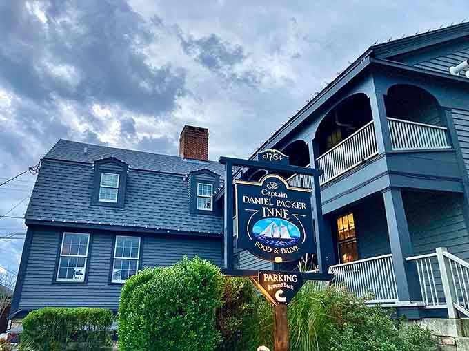 That glow in the windows isn't just ambiance; it's two centuries of hospitality calling you inside for dinner.
