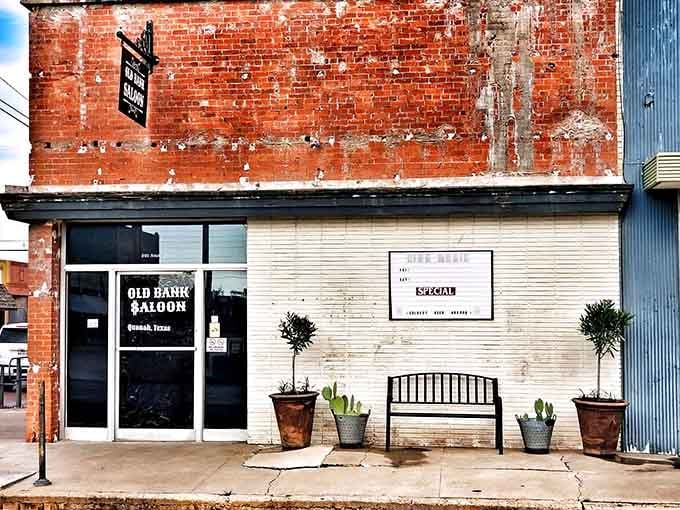 That weathered brick and cream facade isn't just charming, it's basically architectural time travel in building form.