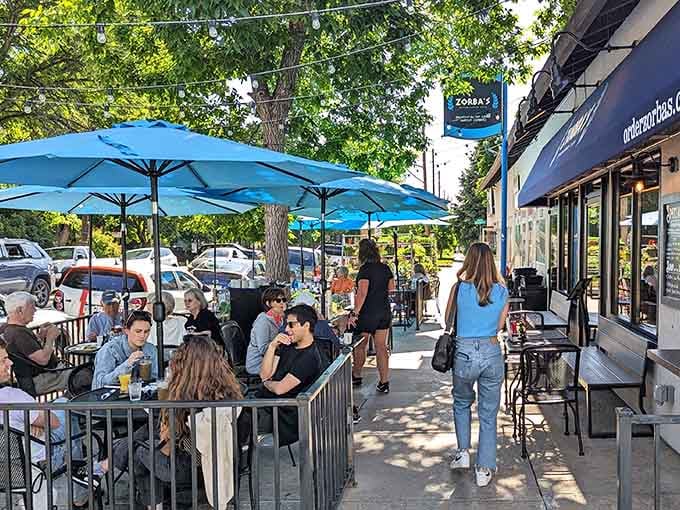 That signature blue awning isn't just for show, it's your beacon to Mediterranean bliss in the Denver neighborhood.