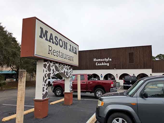 That cow-print sign post isn't messing around, it's telling you exactly what kind of down-home goodness awaits inside.