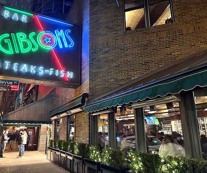 That iconic neon sign beckons like a lighthouse for hungry souls seeking Chicago's finest beef experience.