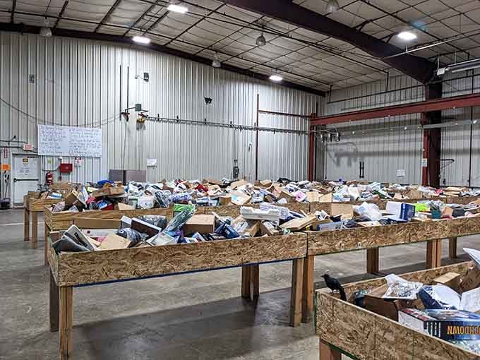 Rows of wooden bins stretch across the warehouse floor like a treasure map waiting to be explored.