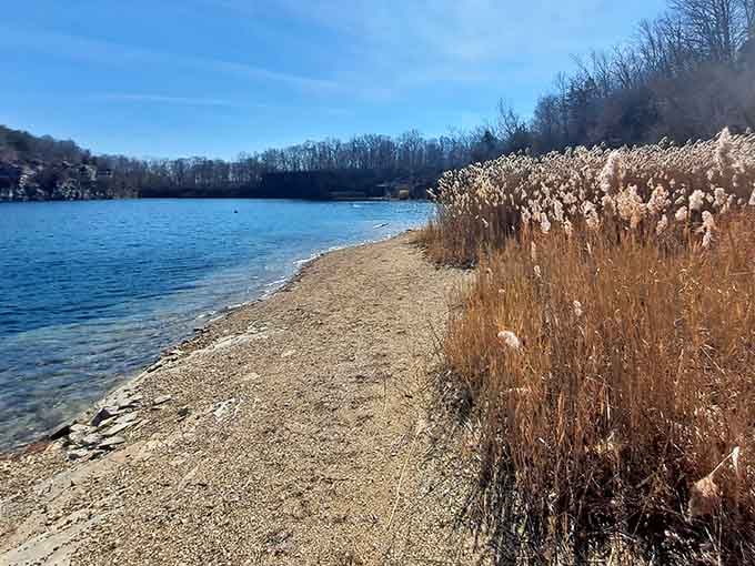 A sandy beach beside crystal-clear quarry water proves Indiana has been holding out on us this whole time.