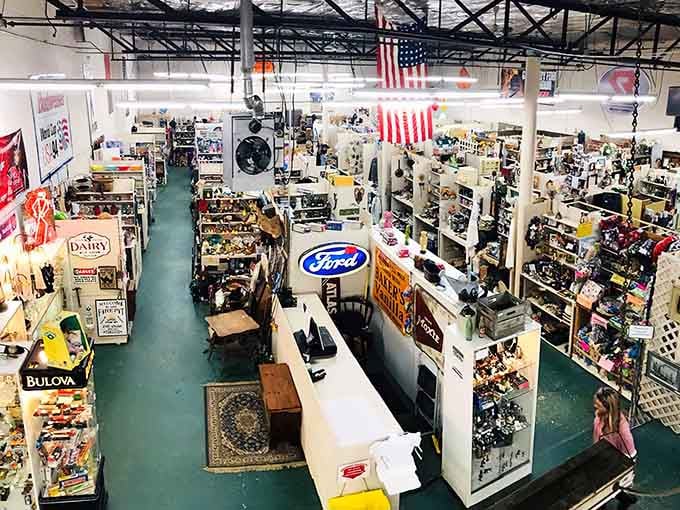 Rows of treasures stretch endlessly under patriotic flags, proving America's attic is alive and thriving in Palmer.