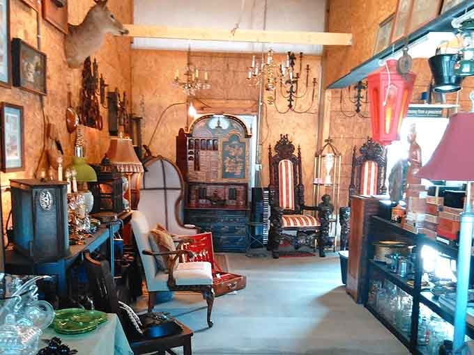 Step inside where chandeliers meet vintage furniture, creating an atmosphere that's equal parts antique mall and time machine.